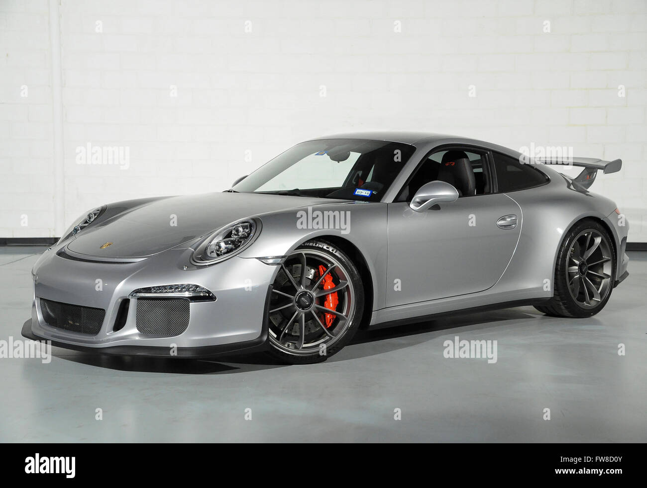 April 1, 2016: A 2015 Porsche GT3 with custom spoiler and leather ...