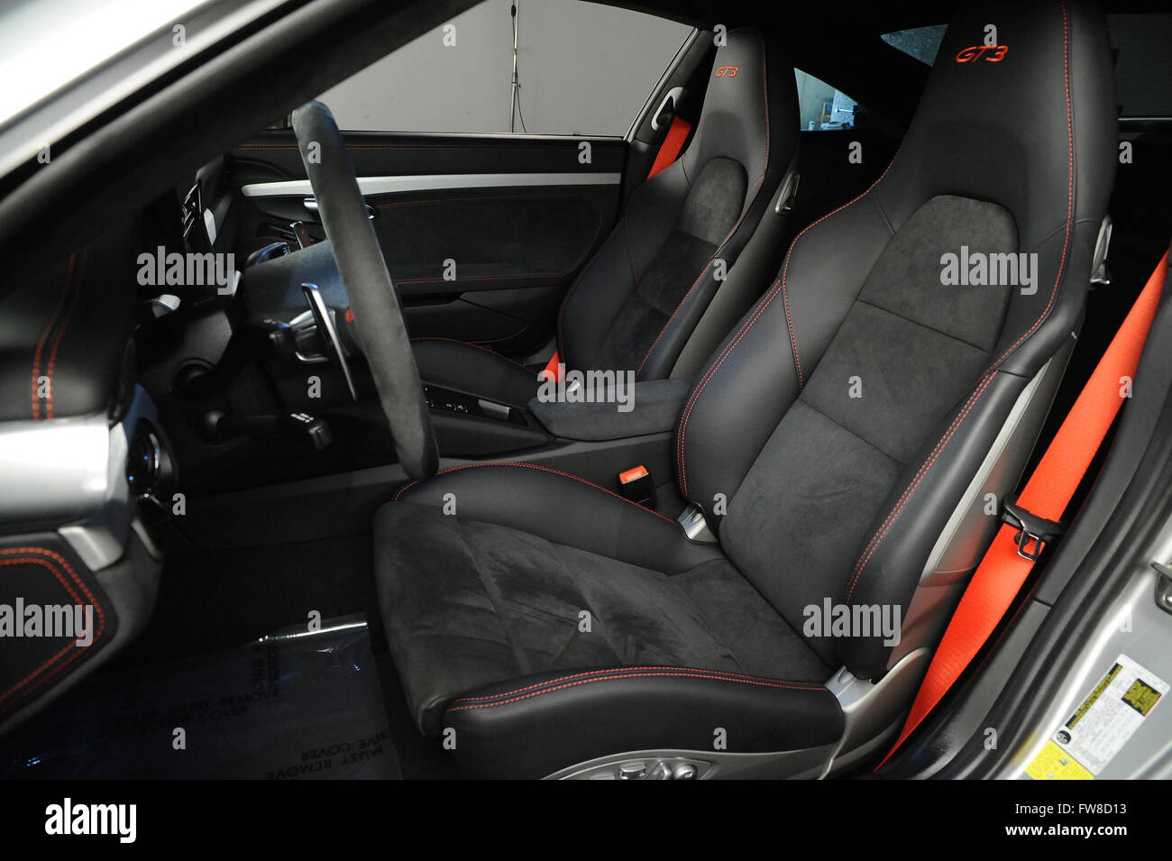 April 1, 2016: A 2015 Porsche GT3 with custom spoiler and leather ...