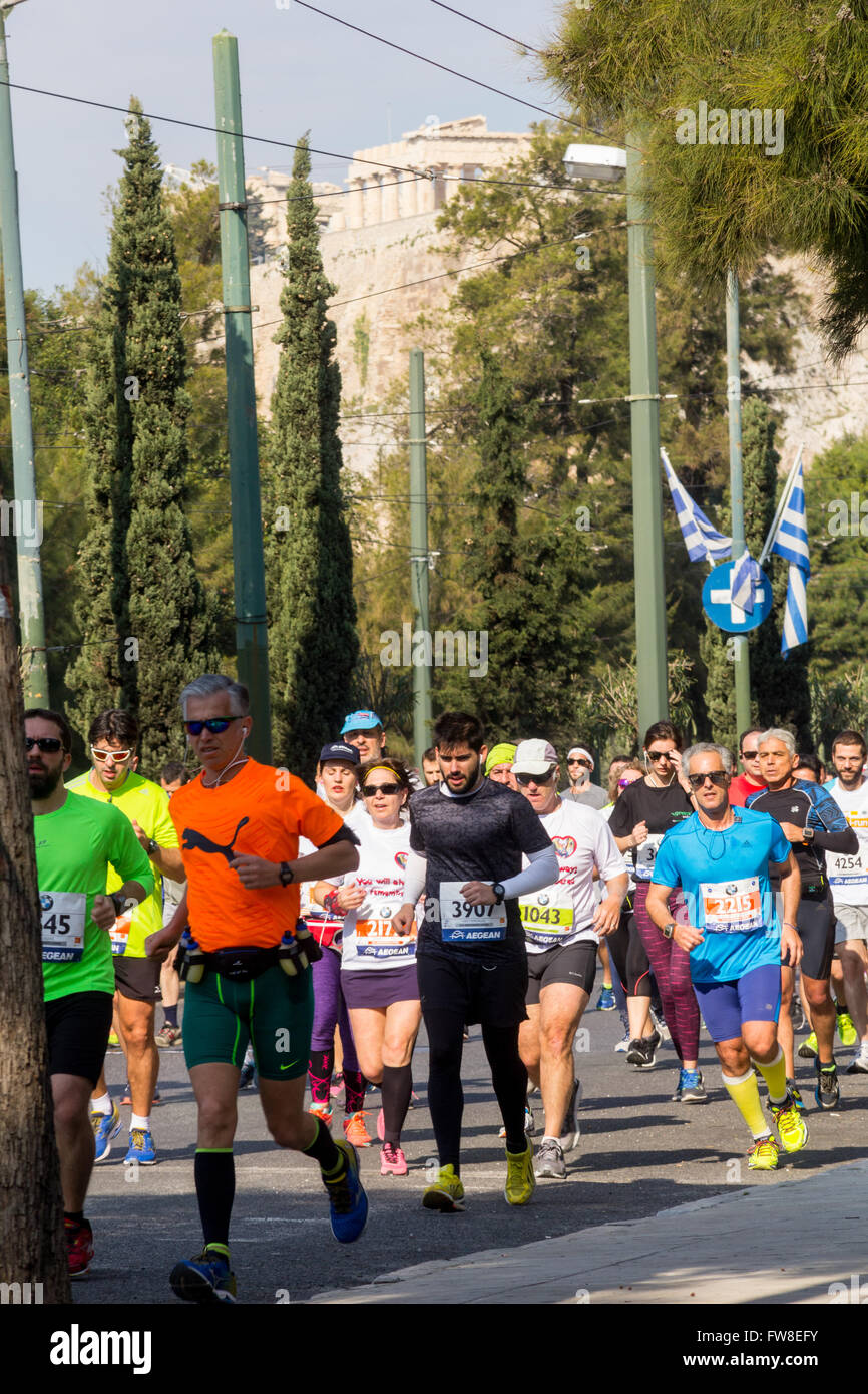 Acropolis and the Parthenon are seen in the background, as athletes ...