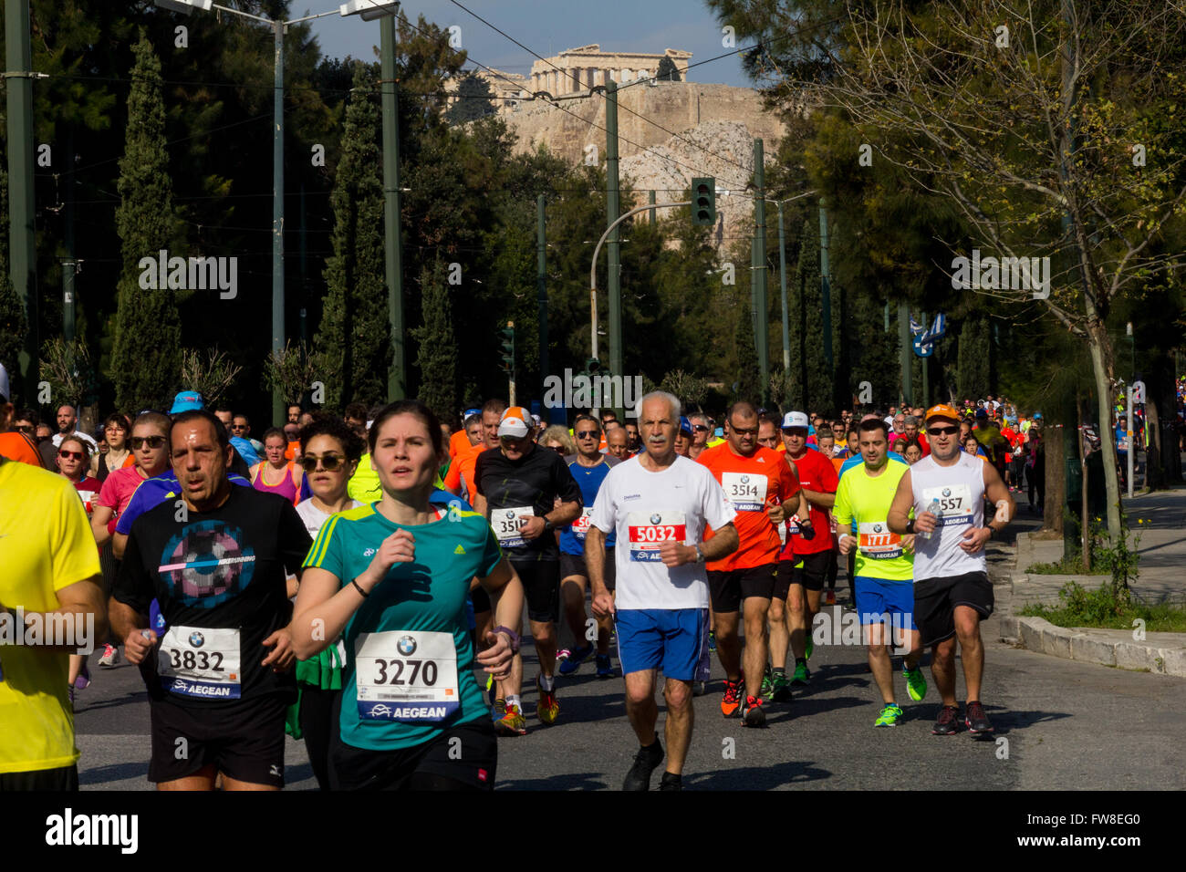 Acropolis and the Parthenon are seen in the background, as athletes ...
