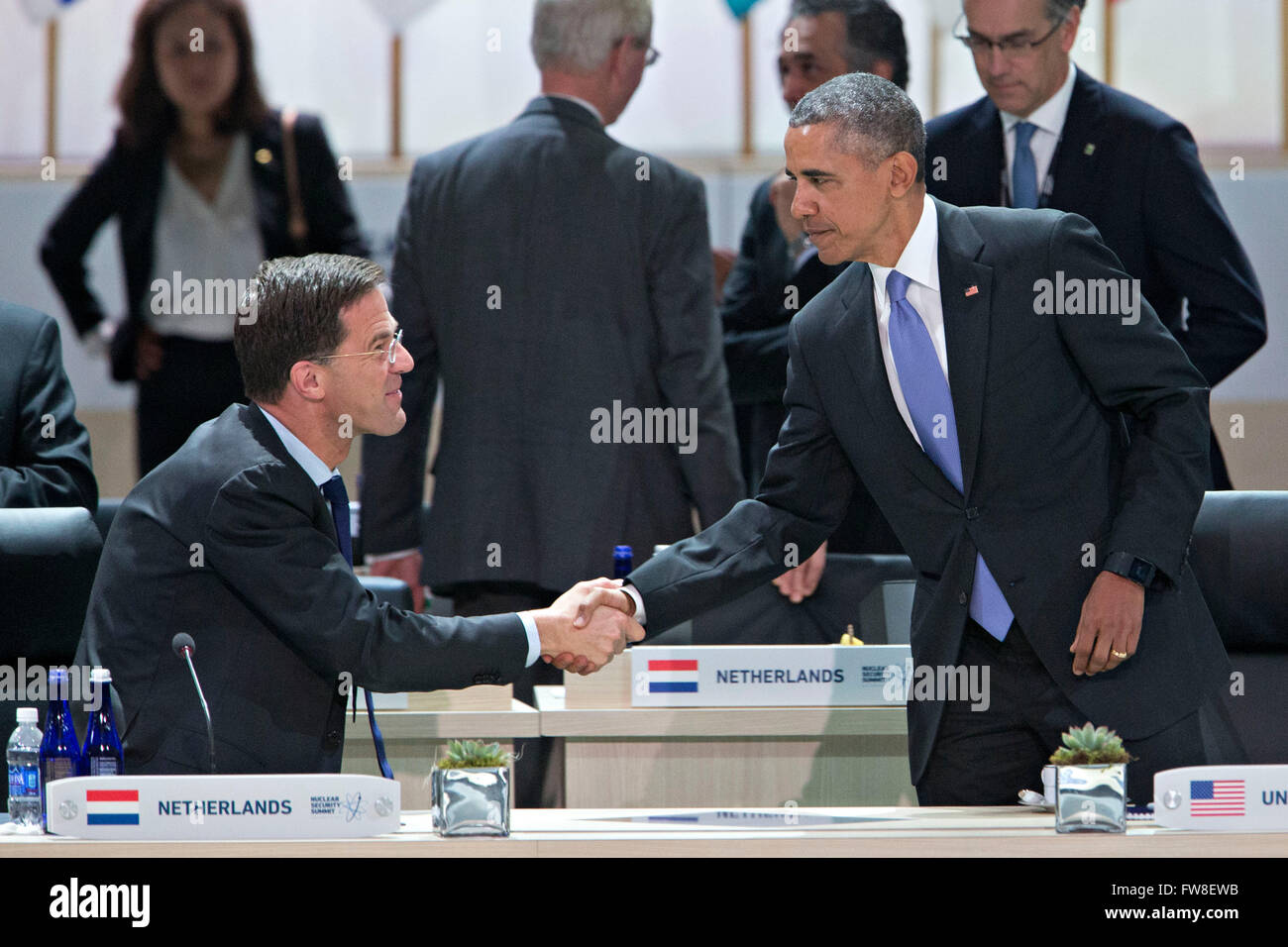 United States President Barack Obama, right, shakes hands with Mark ...