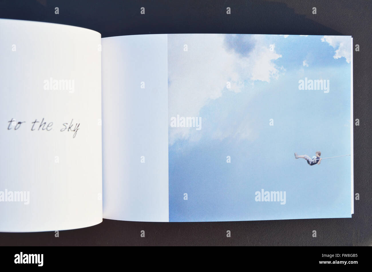 Opened book on sky hi-res stock photography and images - Alamy