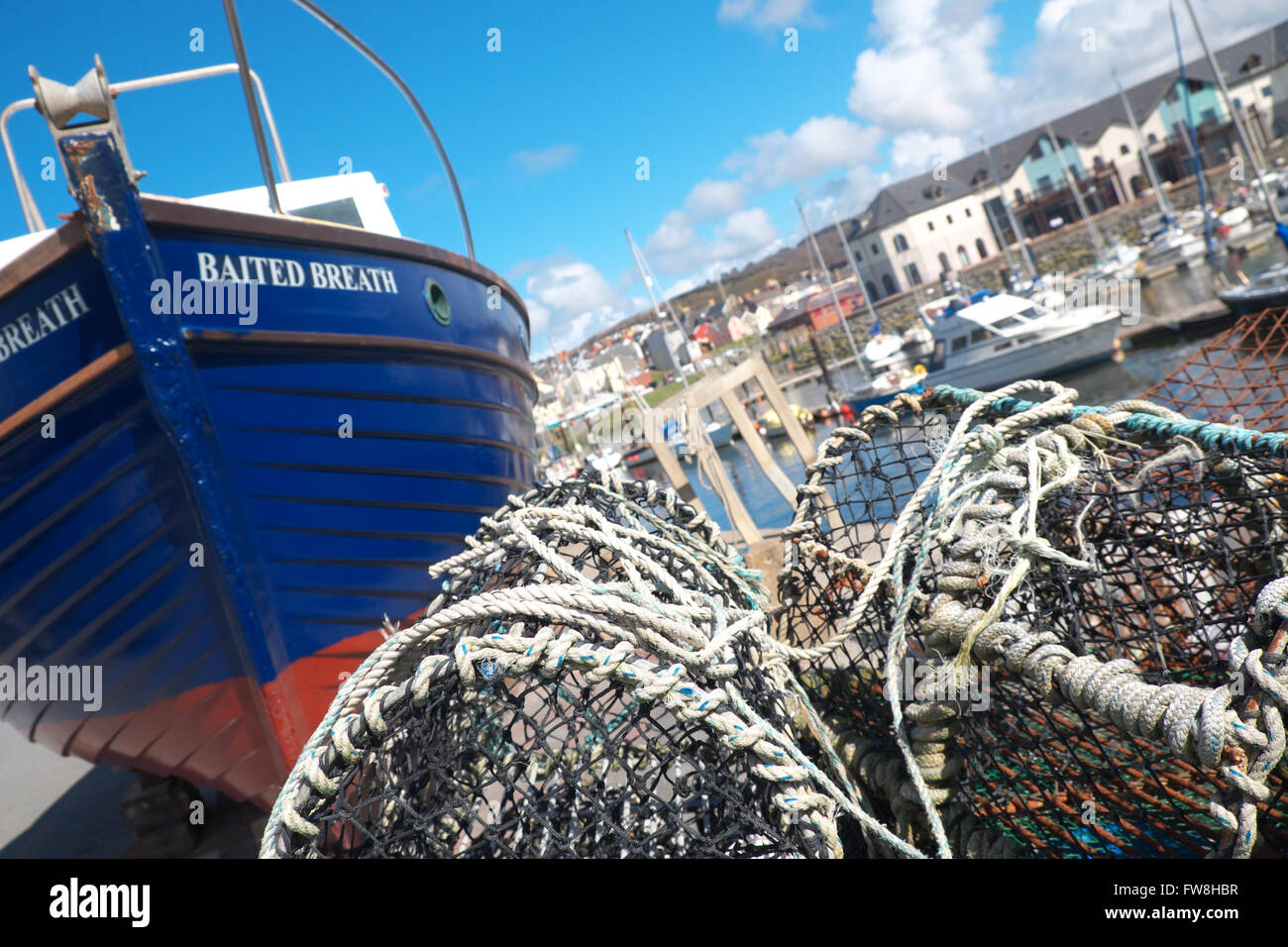Aberystwyth Wales fishing harbour with nets pots and boats Stock Photo ...