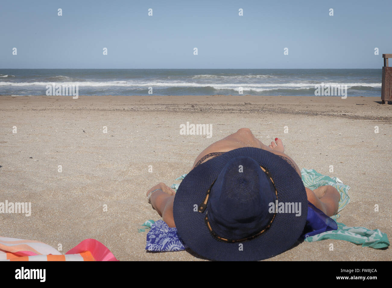 mother resting in a beach Stock Photo - Alamy