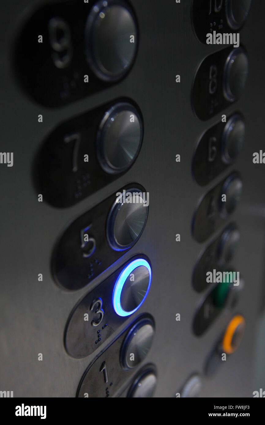 Close up detail of the buttons in a lift Stock Photo - Alamy