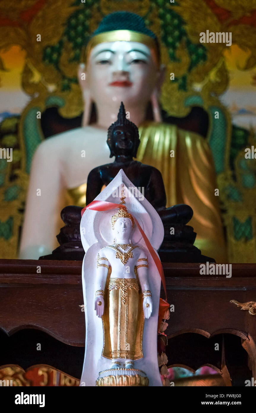 Buddha cast with gold elements Stock Photo - Alamy