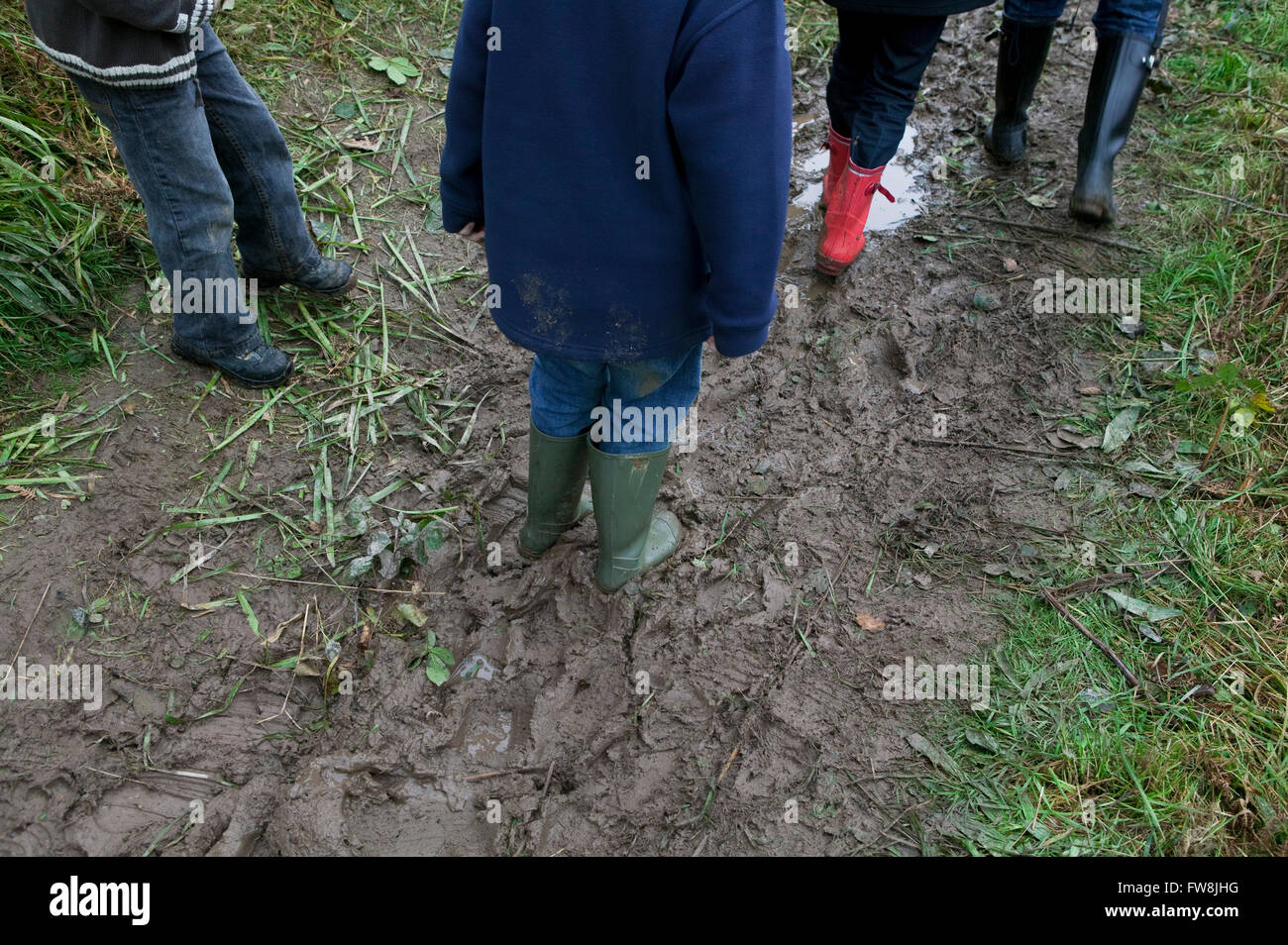 Walking through thick mud children hi-res stock photography and images ...