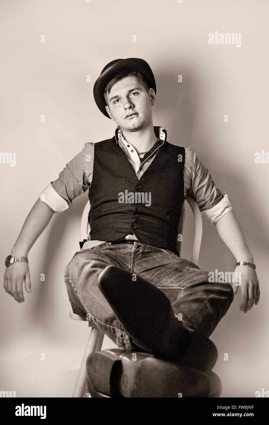 young handsome man in bowler hat Stock Photo - Alamy