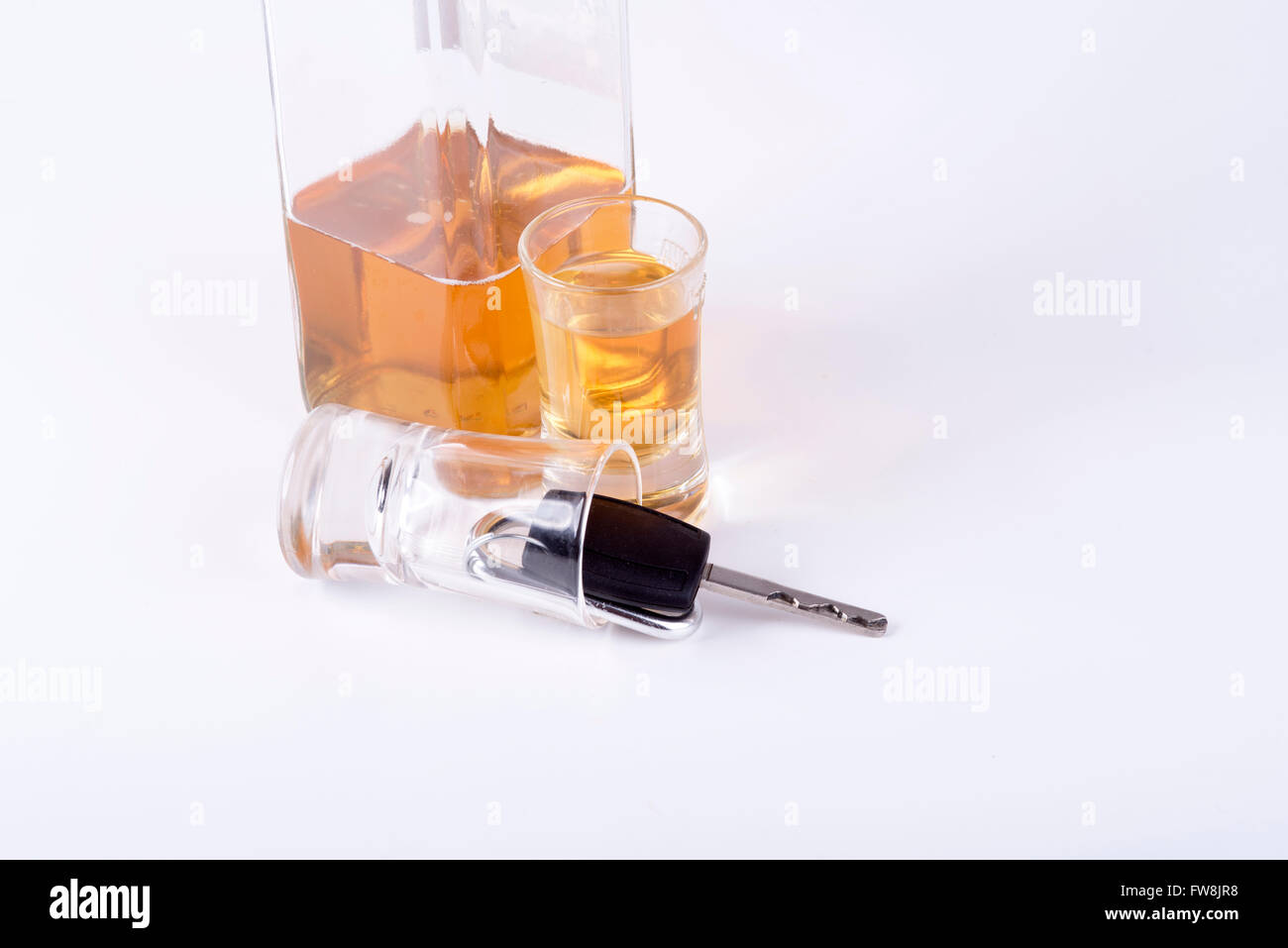 photo on the white background alcohol, keys Stock Photo - Alamy