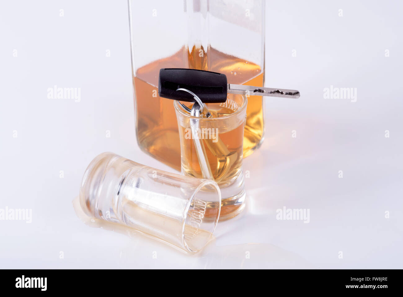 photo on the white background alcohol, keys Stock Photo - Alamy
