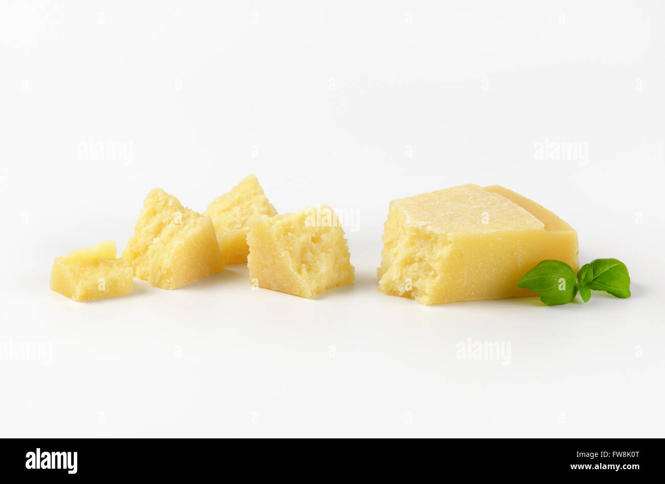 pieces of fresh parmesan cheese on white background Stock Photo - Alamy