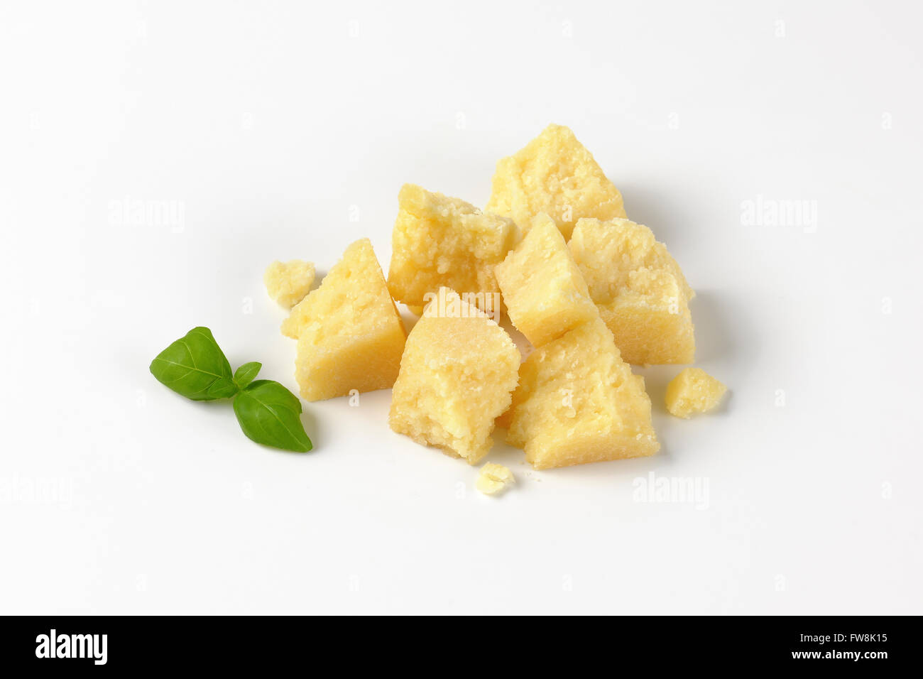 pieces of fresh parmesan cheese on white background Stock Photo - Alamy