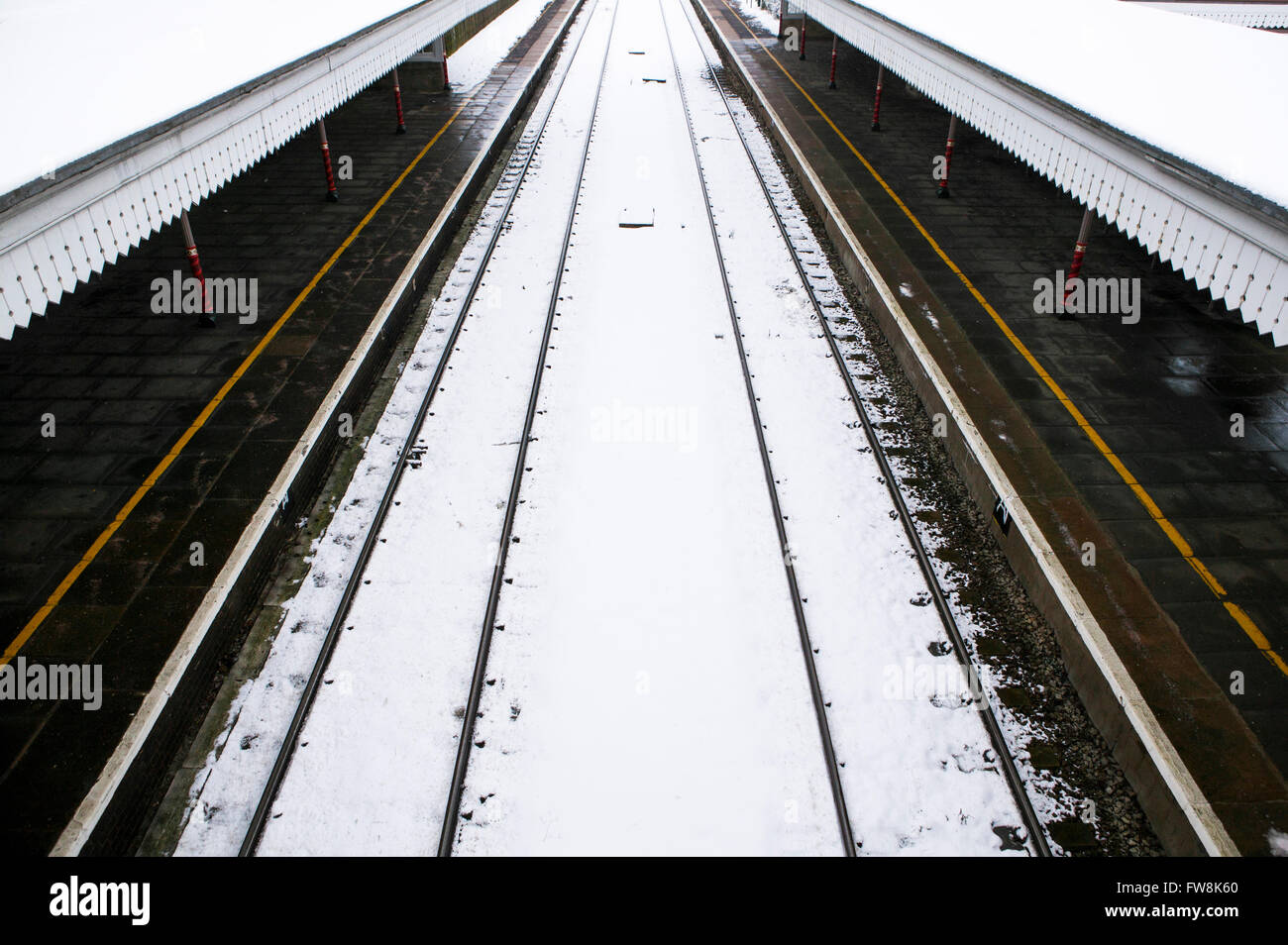 Train tracks heading off in to the distance with no trains on, the line ...