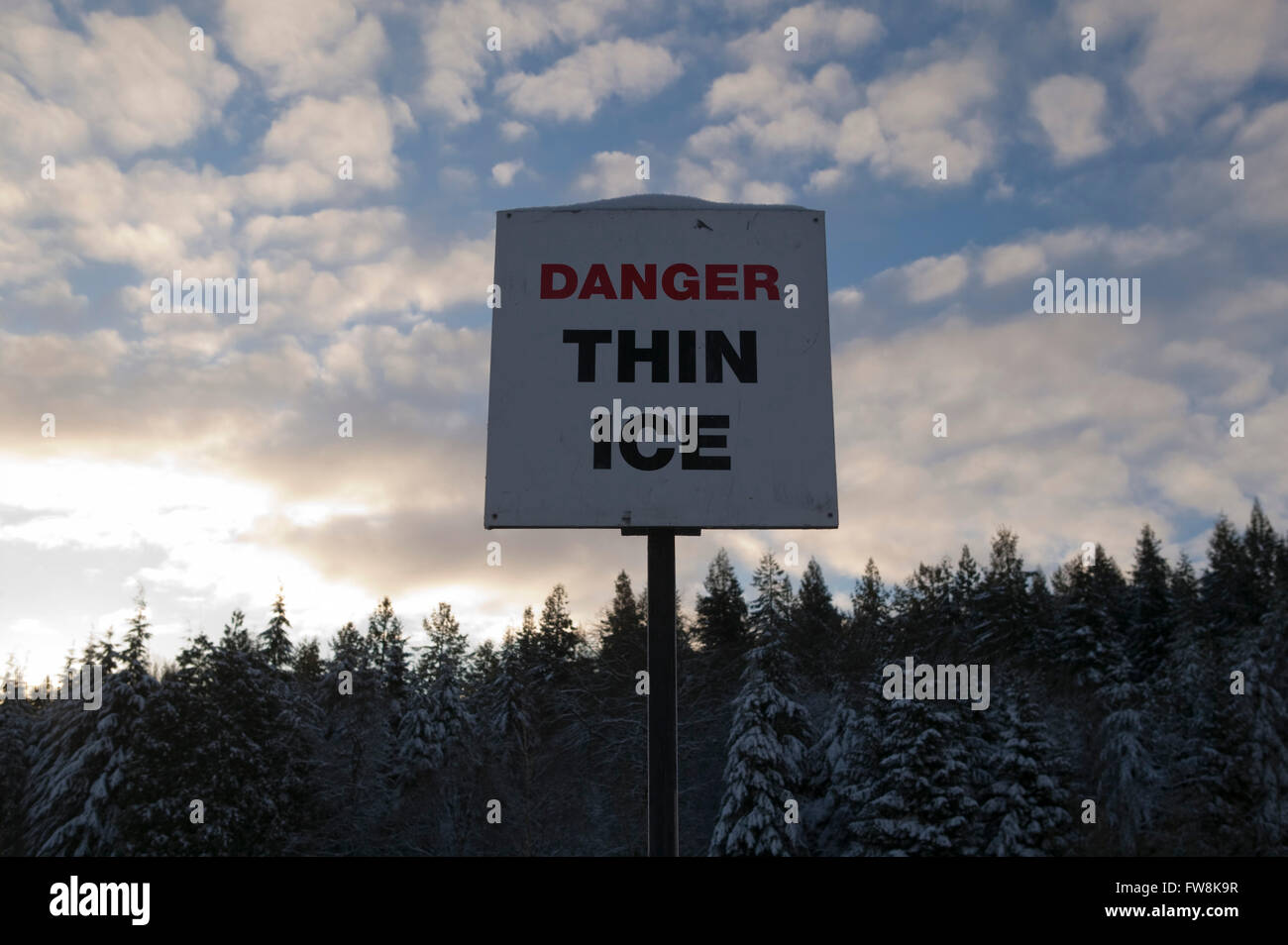 Dangers of walking on ice covered lake hi-res stock photography and ...