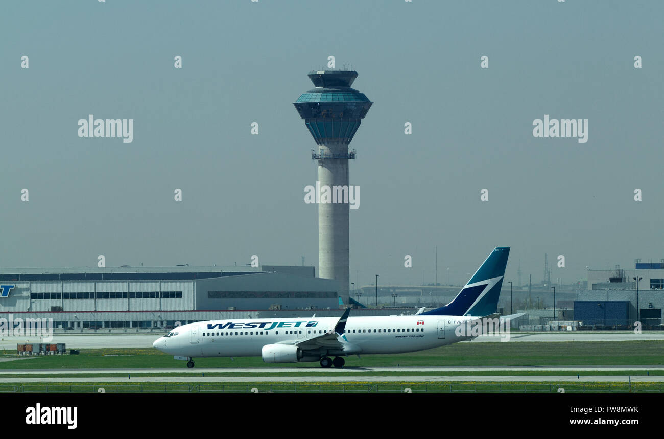 A Westjet airplane on the tarmac at Toronto Pearson airport in Toronto ...