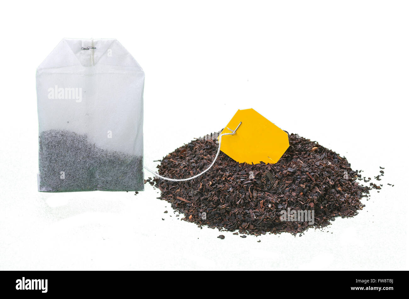 Bunch of tea and a bag isolated on white Stock Photo - Alamy