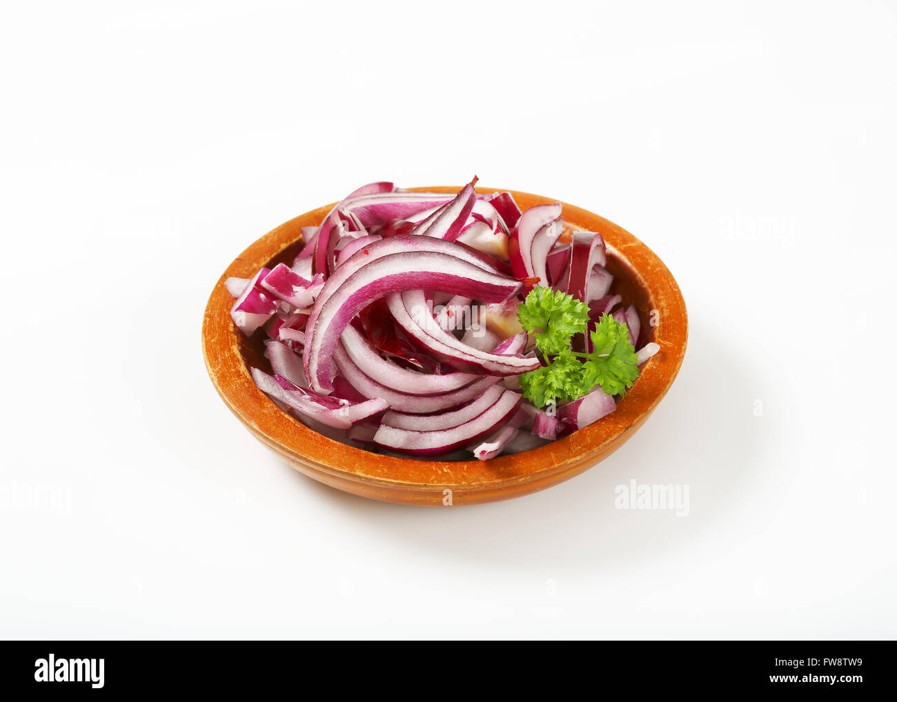bowl of chopped red onion on white background Stock Photo - Alamy