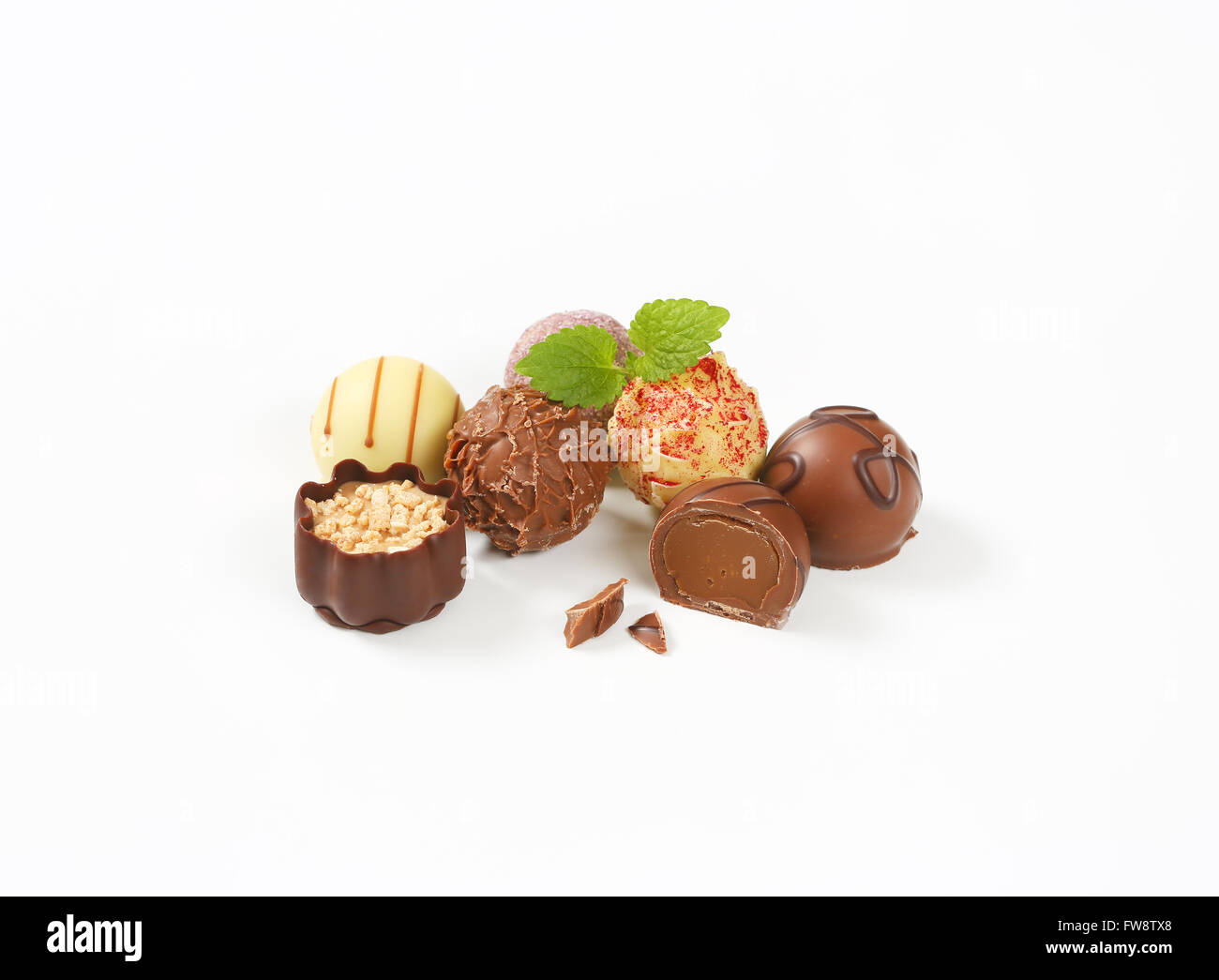 assorted belgian chocolate pralines on white background Stock Photo - Alamy