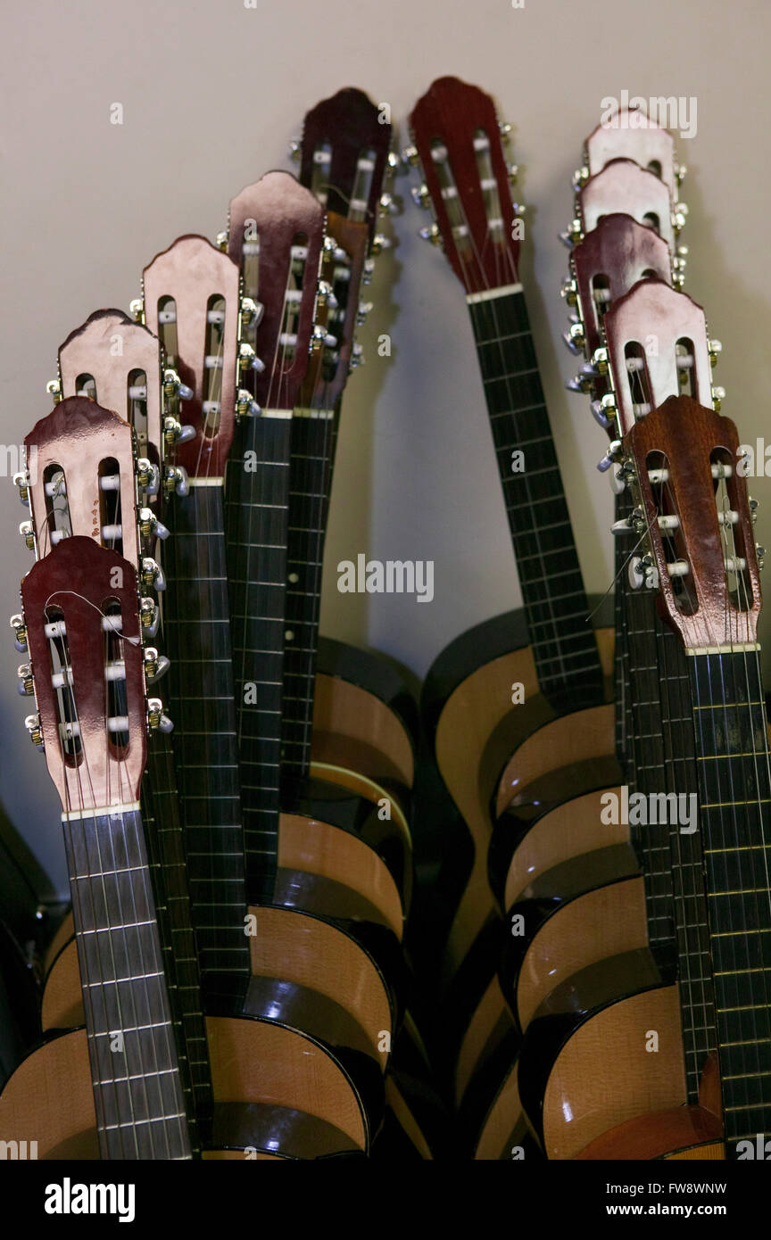A stack of guitars in a school music room Stock Photo - Alamy