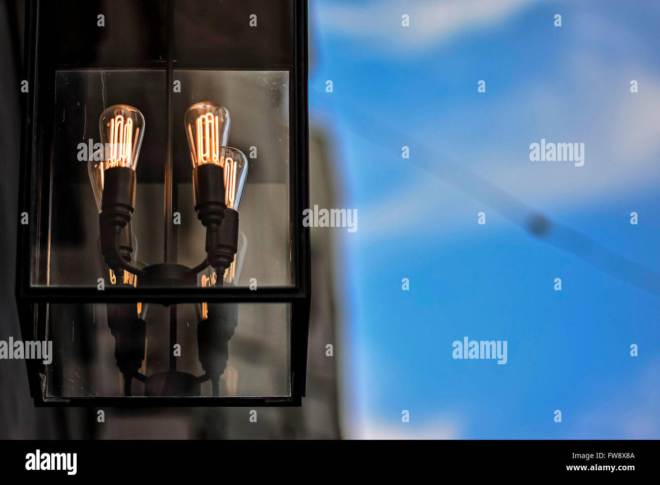 Electric light Bulb - old style with filament Stock Photo - Alamy