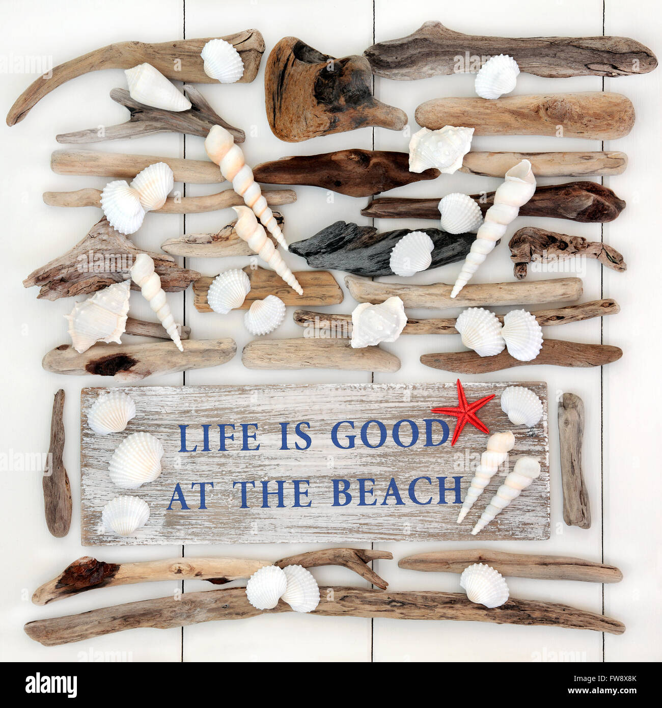 Abstract background with life is good at the beach sign with driftwood ...