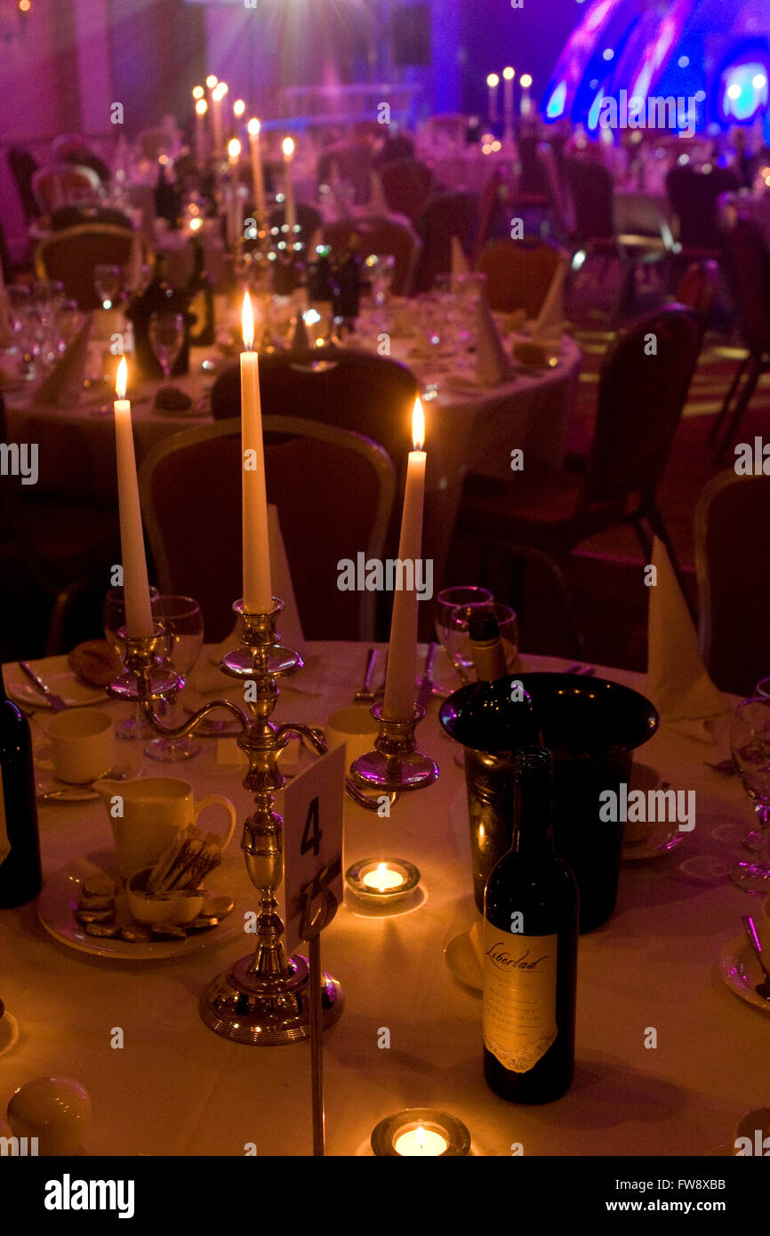 A dining hall in a large hotel that has been fitted out for a corporate ...