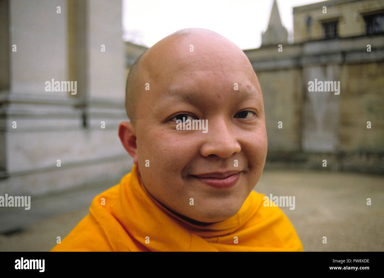 Saffron coloured robe hi-res stock photography and images - Alamy