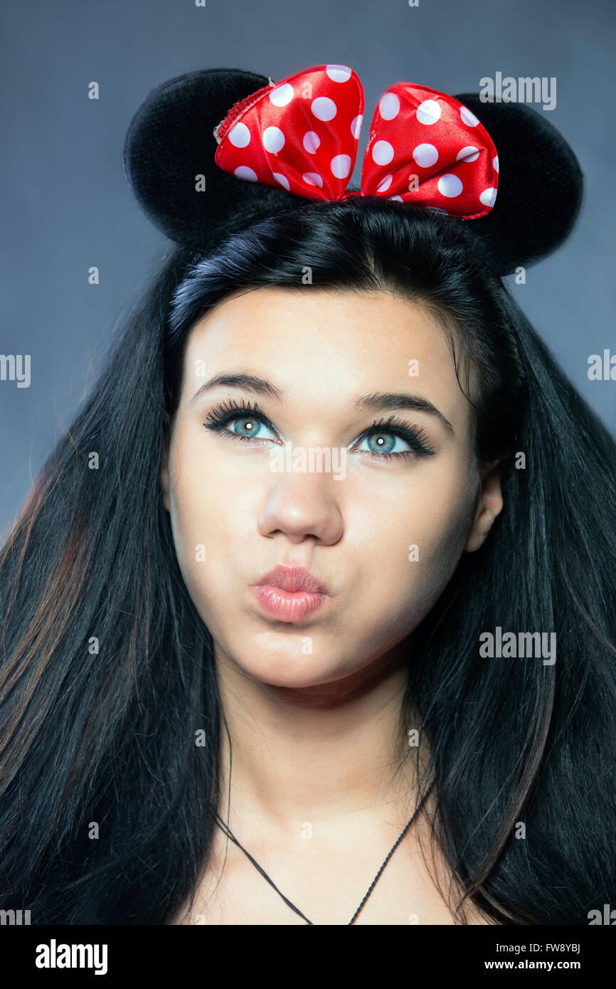 Close studio portrait of a girl with mouse ears, girl with beautiful ...