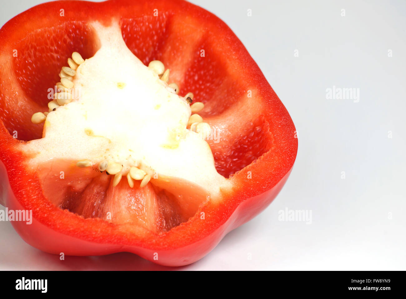 Closeup red bell pepper fresh on white background Stock Photo - Alamy