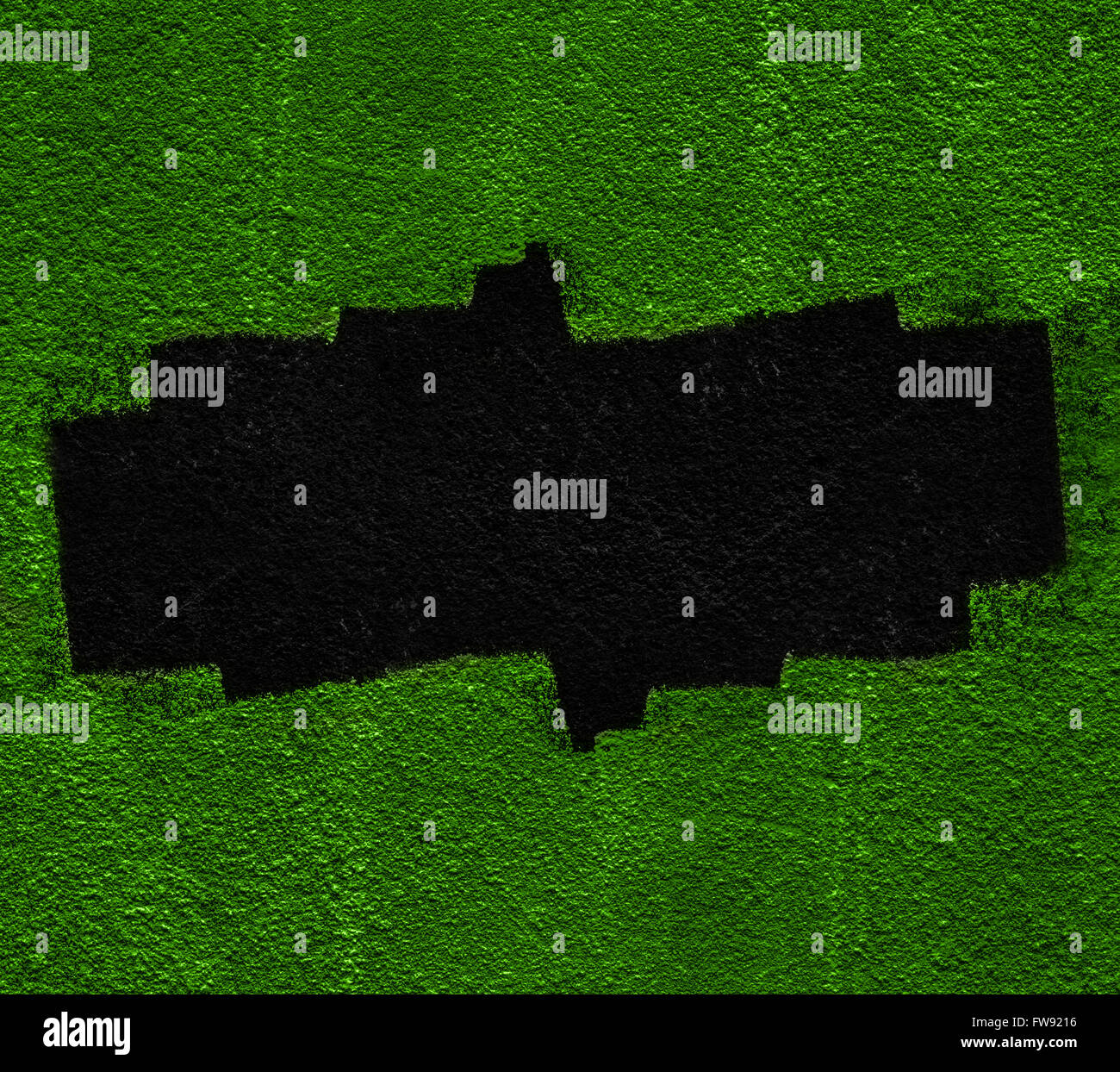 black Hole cracks in the green wall. Broken concrete template for a ...