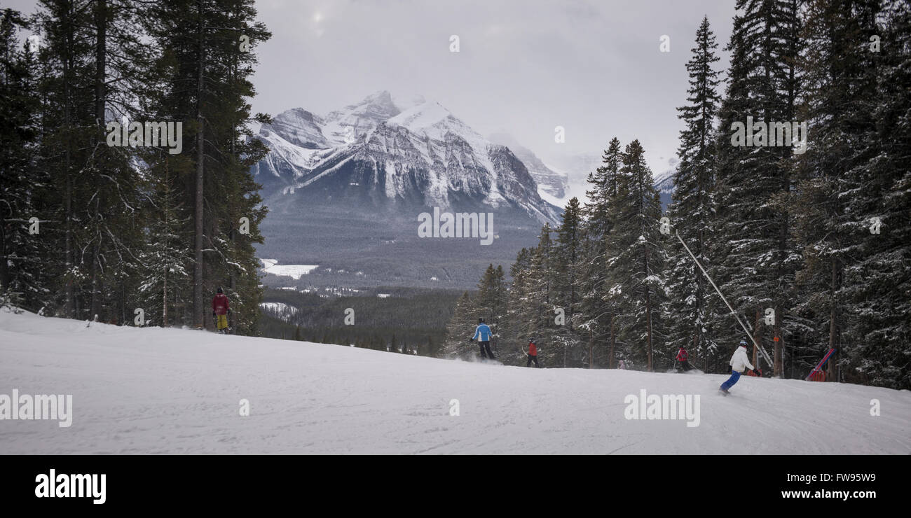 People skiing and snowboarding, Lake Louise, Banff National Park ...