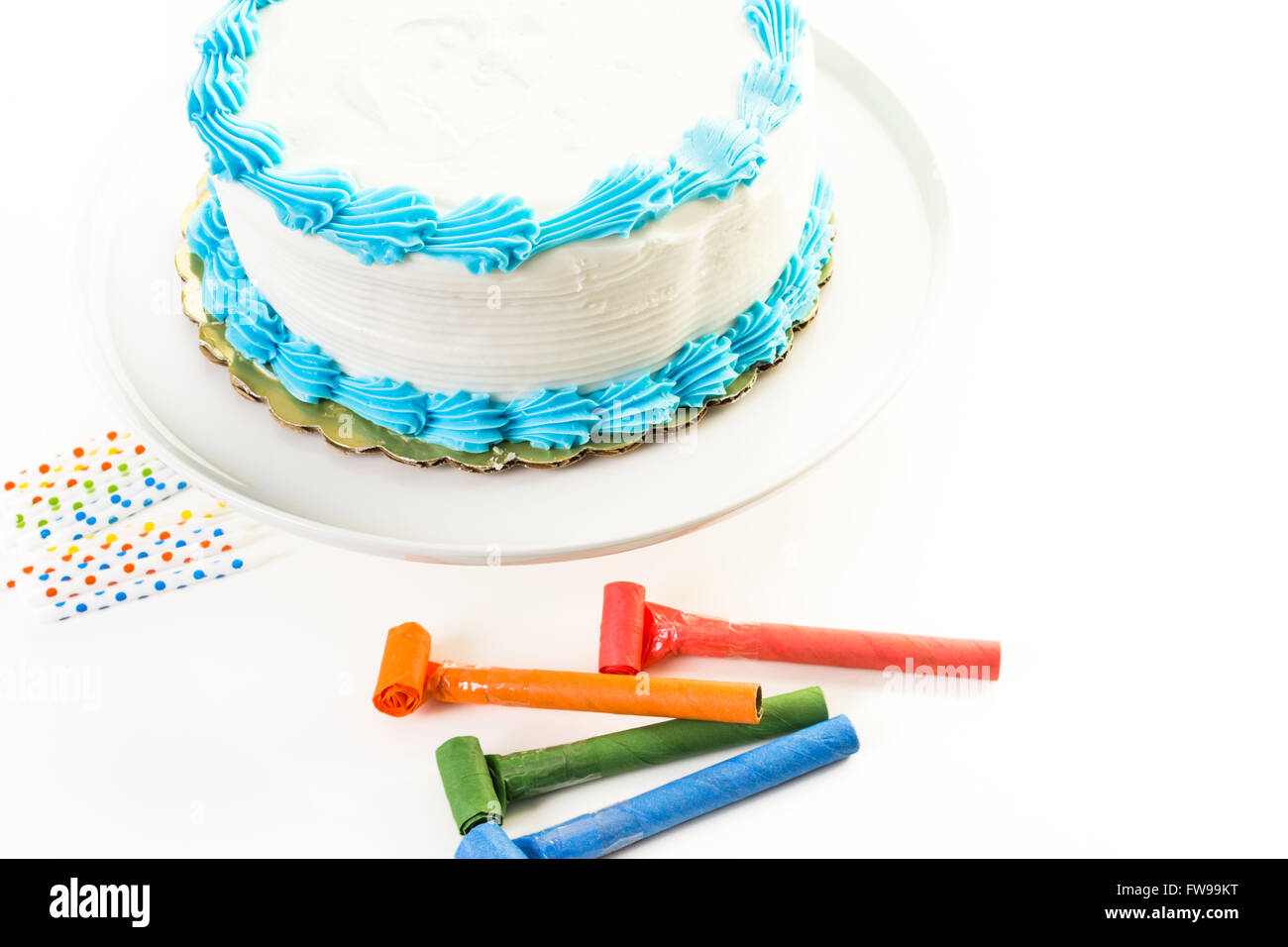 Simple white Birthday cake with white and blue icing Stock Photo - Alamy