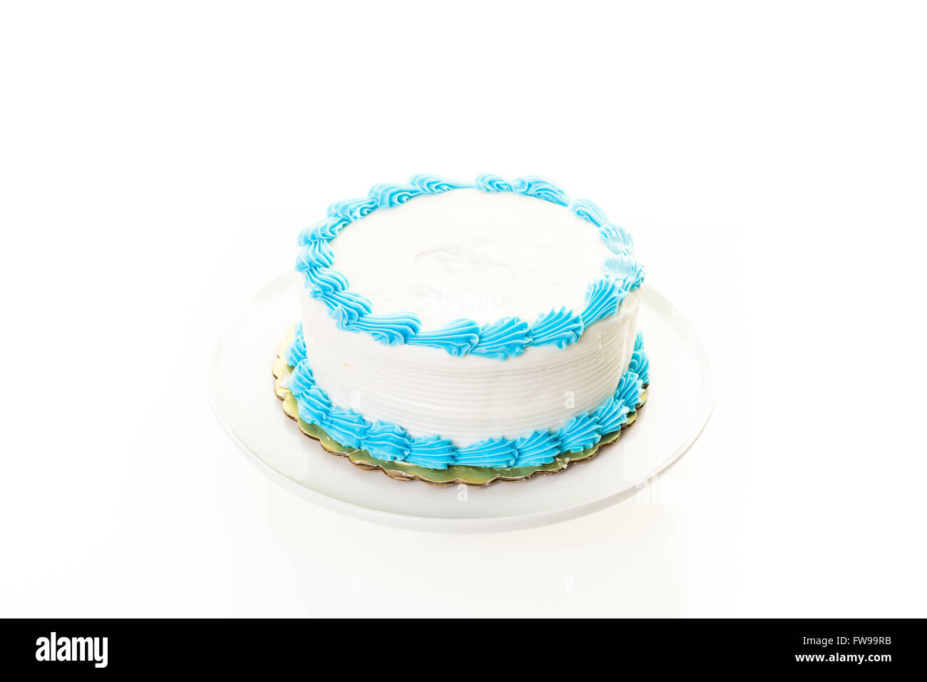 Simple white Birthday cake with white and blue icing Stock Photo - Alamy