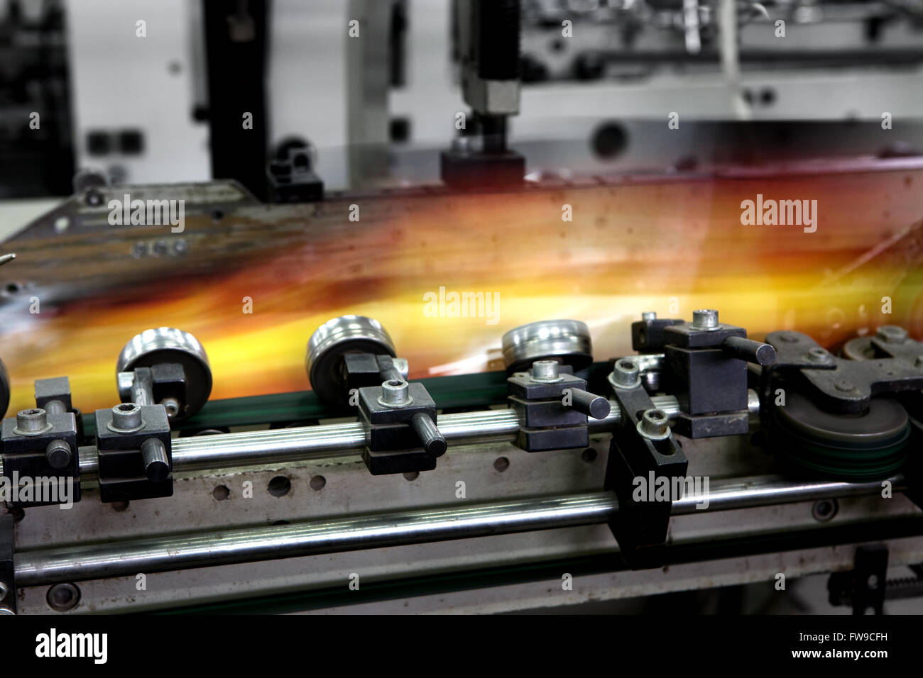 Work of the conveyor in a modern printing house Stock Photo - Alamy