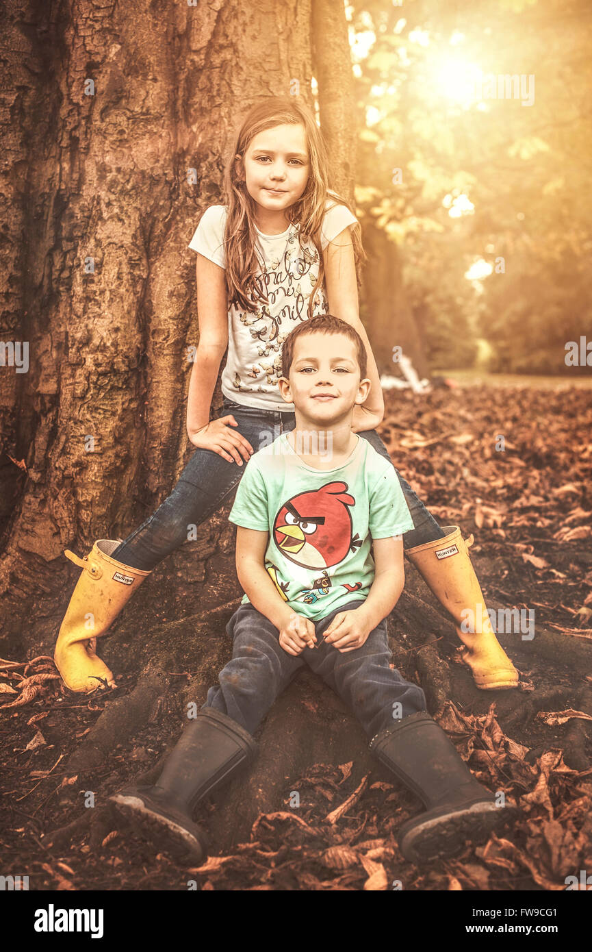Children playing hide and seek park hi-res stock photography and images ...