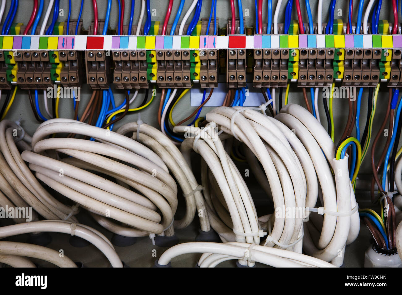Color wires in a box of distribution of an electricity Stock Photo - Alamy