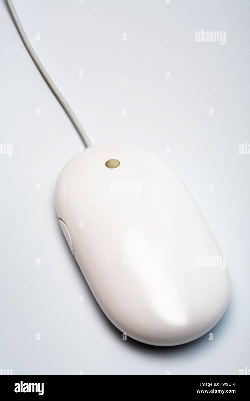 The mouse with a wheel on a gray background Stock Photo - Alamy