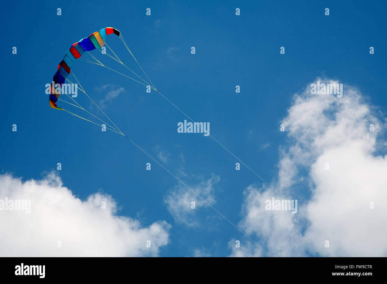 Kite on a background of the sky with clouds Stock Photo - Alamy