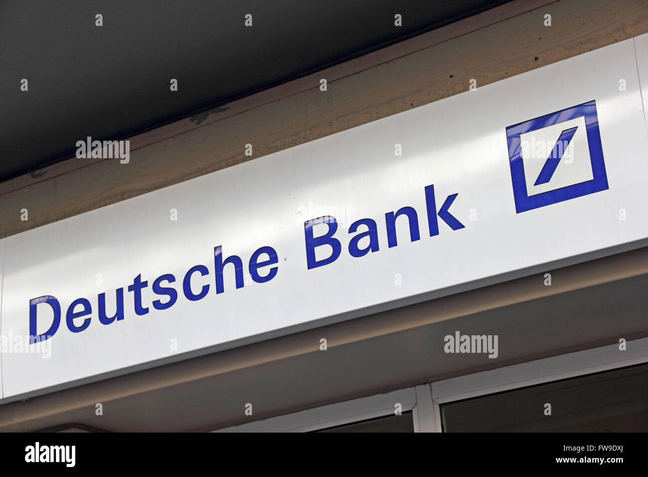 Deutsche Bank sign over bank branch Stock Photo - Alamy