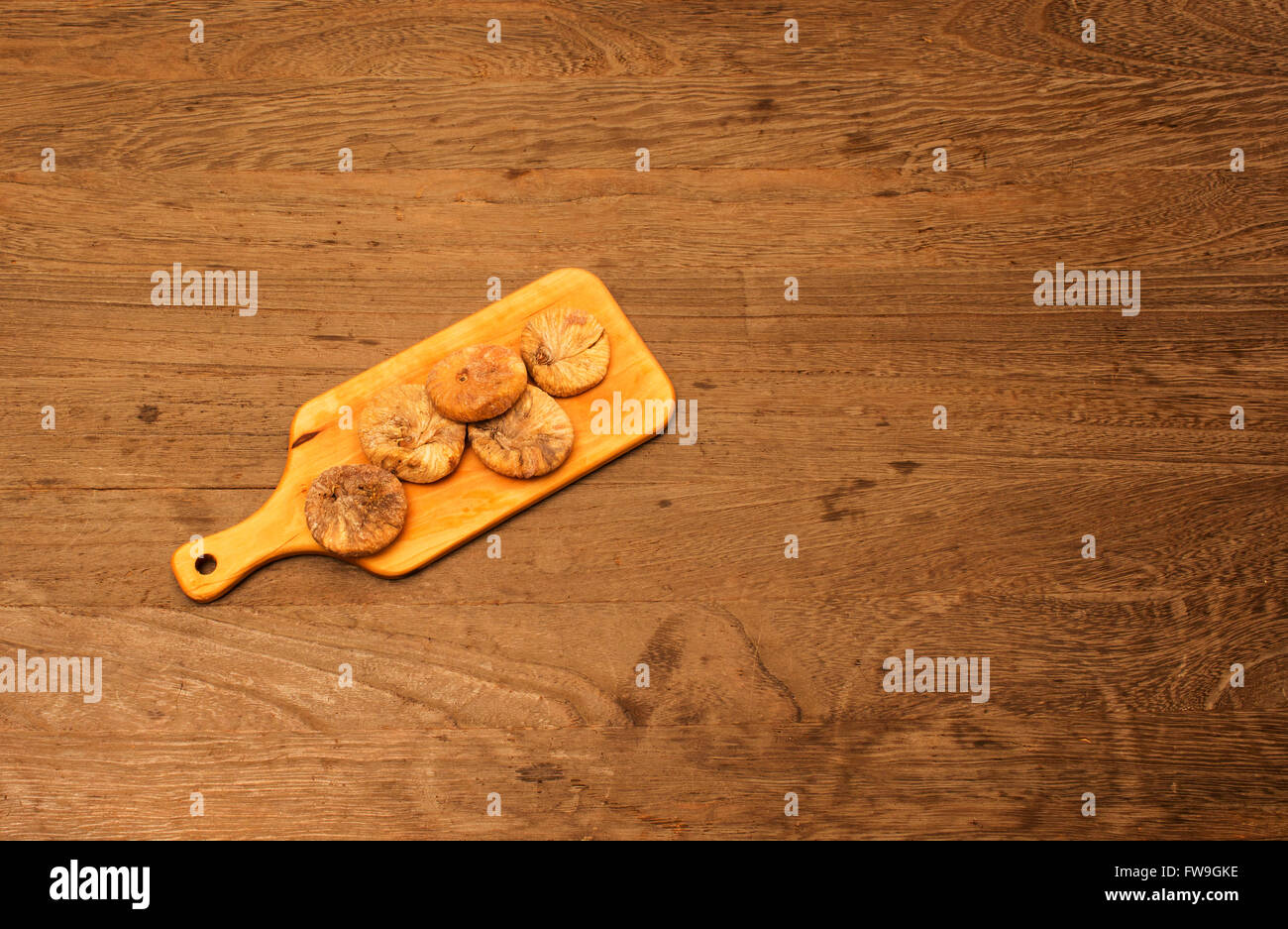 Fig on wood background hi-res stock photography and images - Alamy