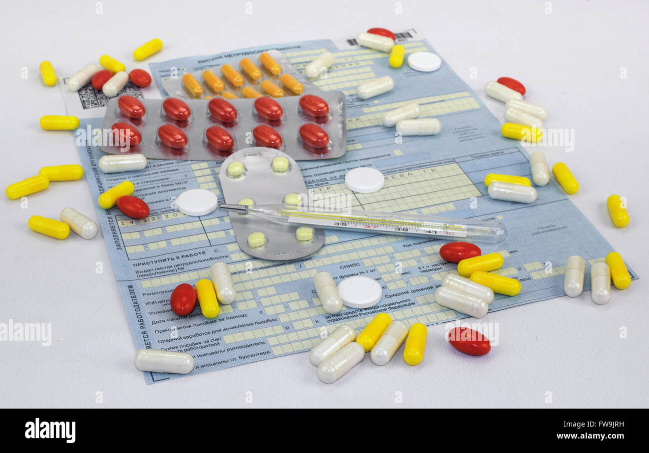 pills, thermometer and a sick-list on a white background Stock Photo ...
