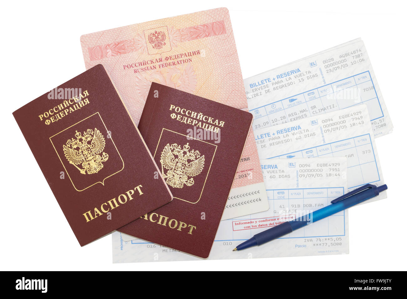 Three russian passports, railway tickets with a pen on white background ...