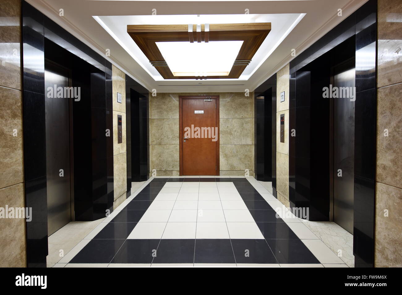 Elevators (lifts) section in the Building Corridor Stock Photo - Alamy