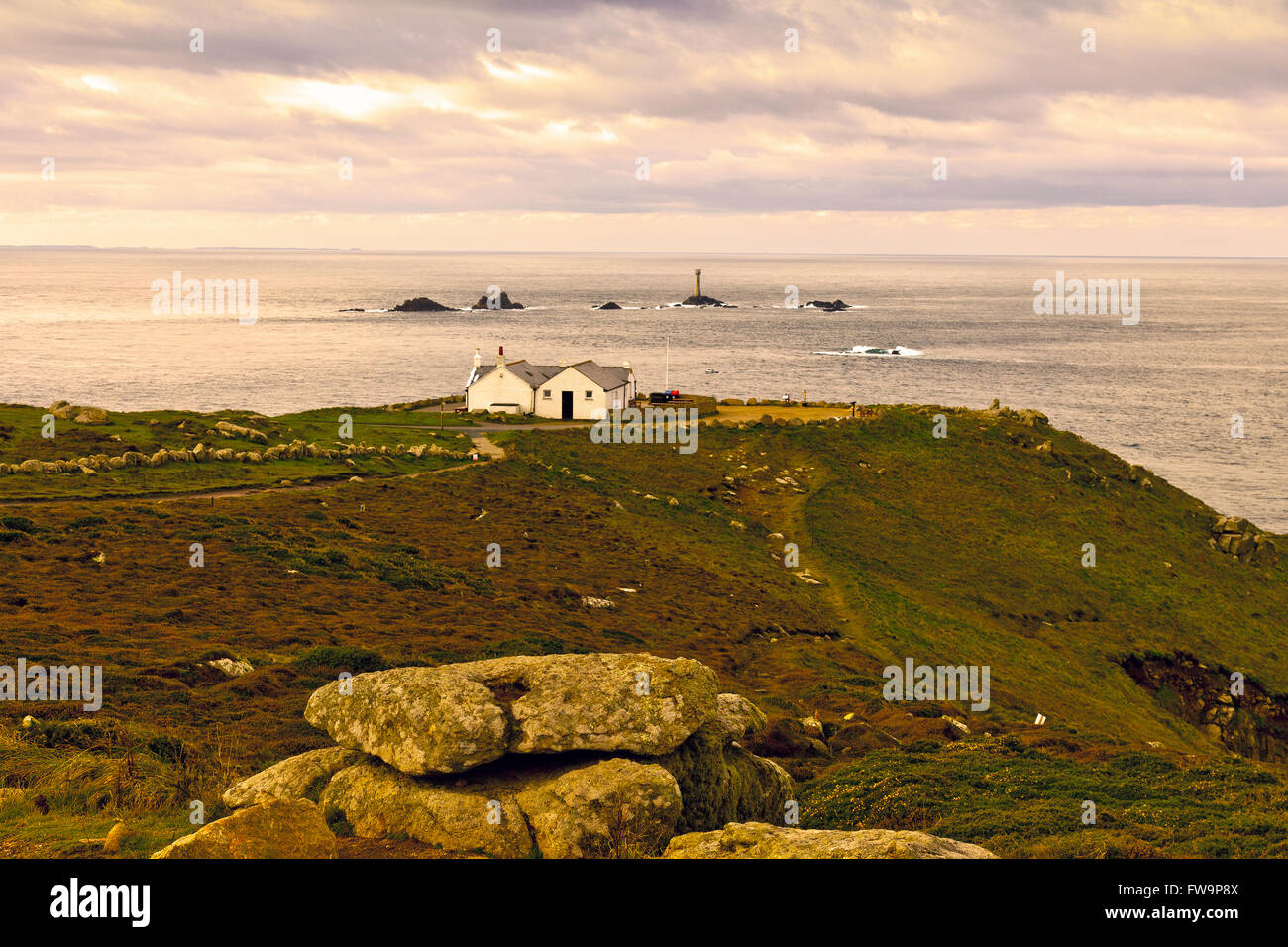 Longships lighthouse and the 'First and Last House' at Land's End ...