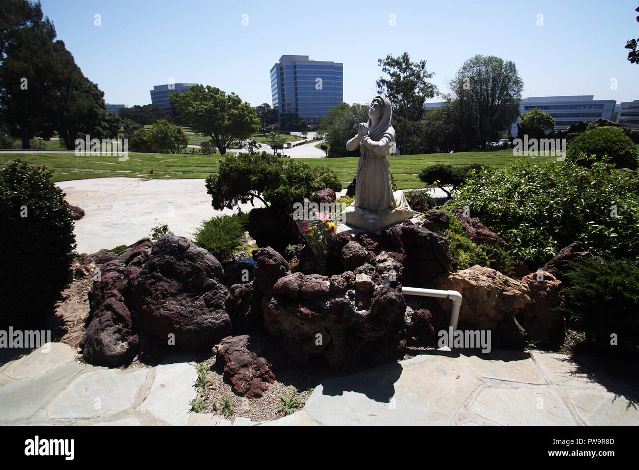 Grotto of holy cross cemetery hi-res stock photography and images - Alamy