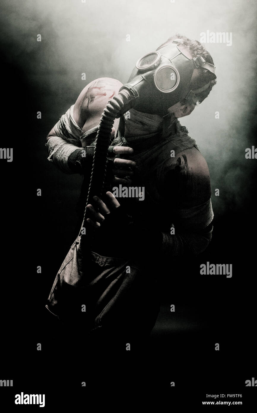 bandaged men in the gas mask on the black background surrounded by ...