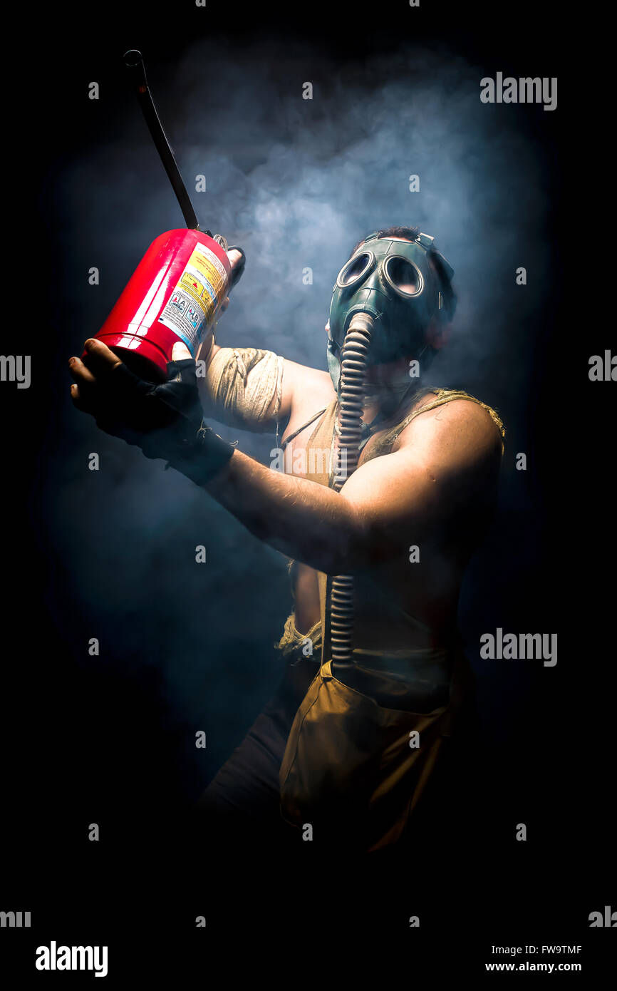 Man with fire extinguisher hi-res stock photography and images - Alamy