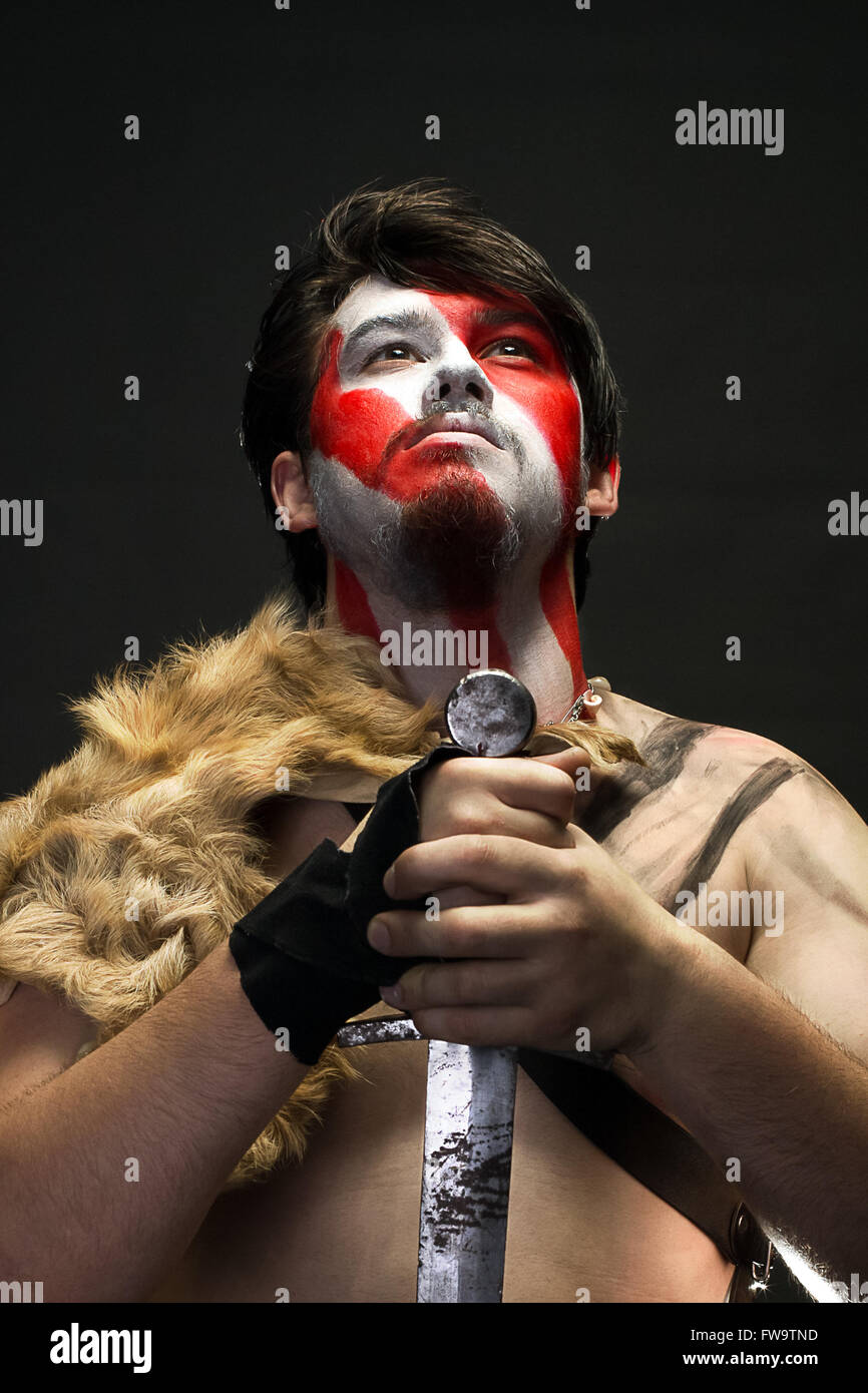 Man holding sword hi-res stock photography and images - Alamy