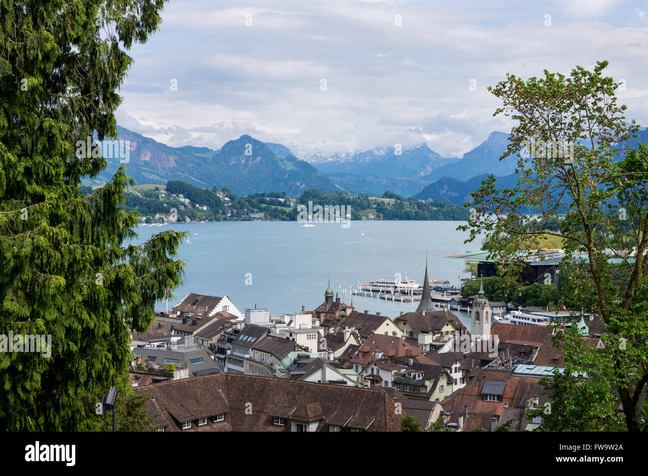 Lake Lucerne from high view point over rooftops with alps in background ...