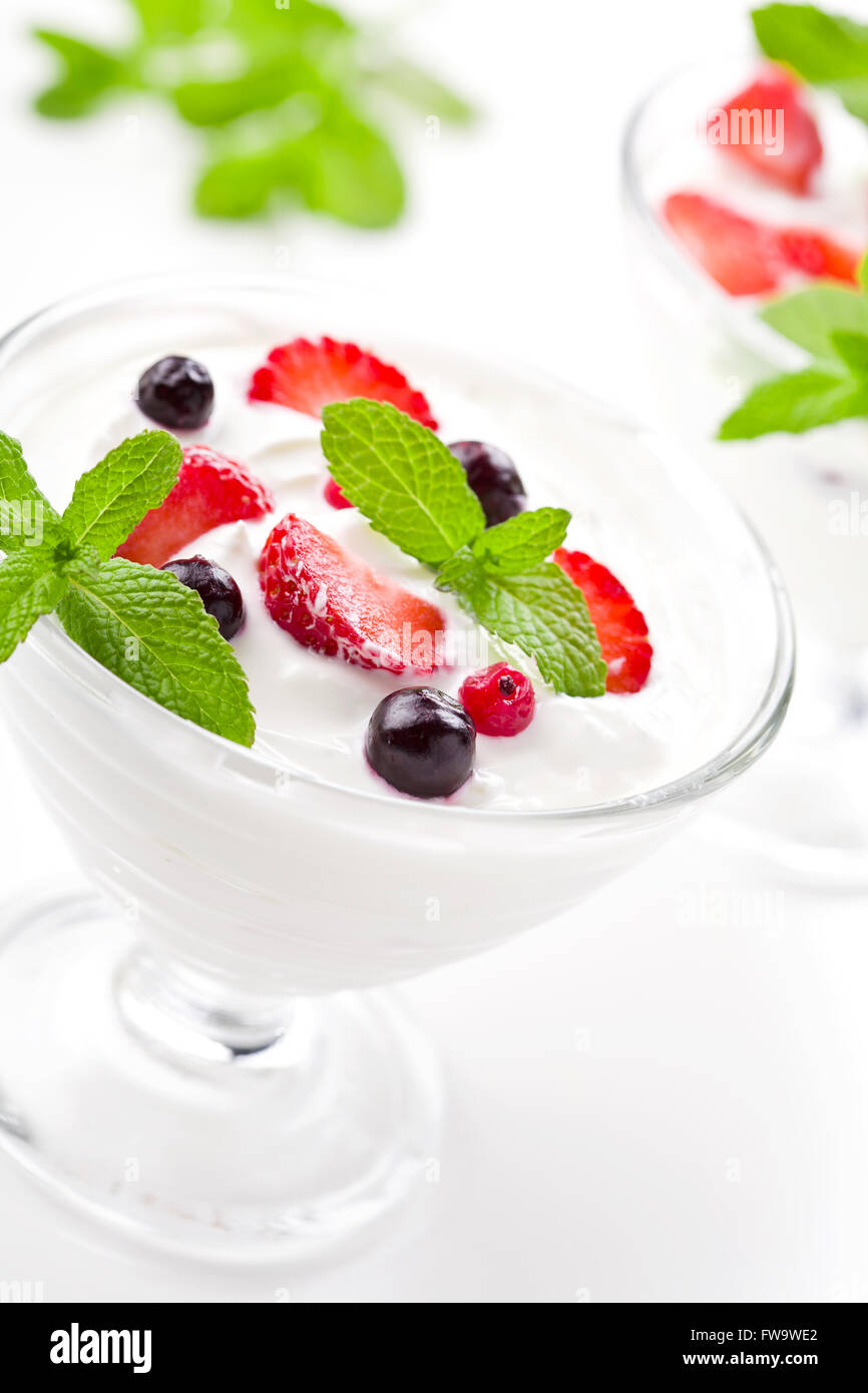Bowls of fresh homemade yogurt with berry fruits Stock Photo - Alamy